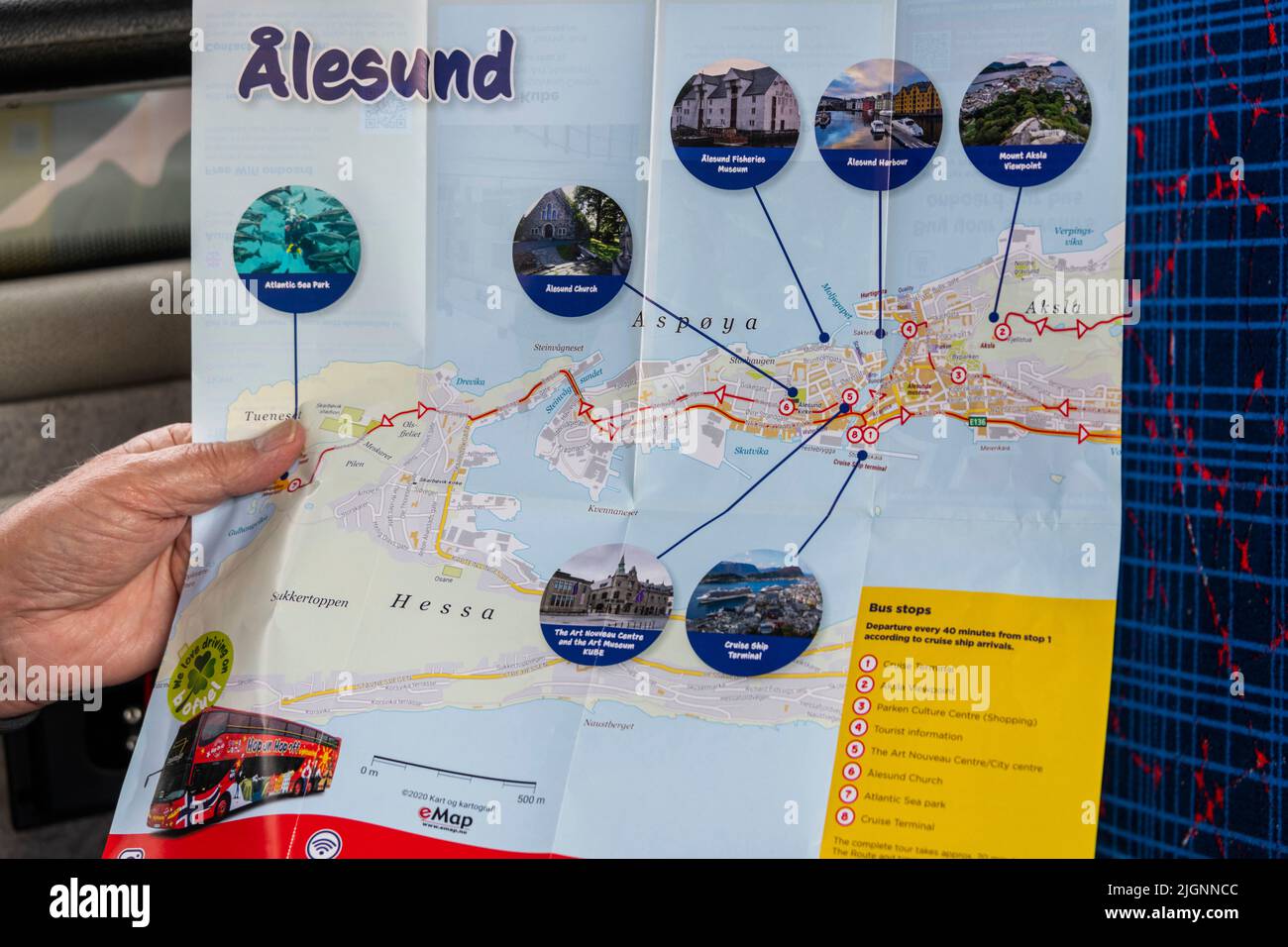 Alesund, male holding Map of Alesund, Norway Stock Photo - Alamy
