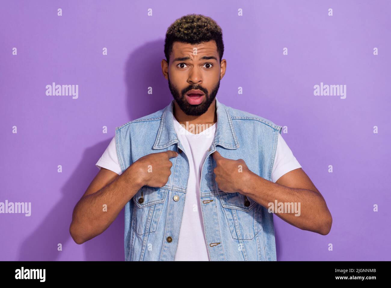Photo of impressed offended man wear jeans waistcoat pointing fingers ...