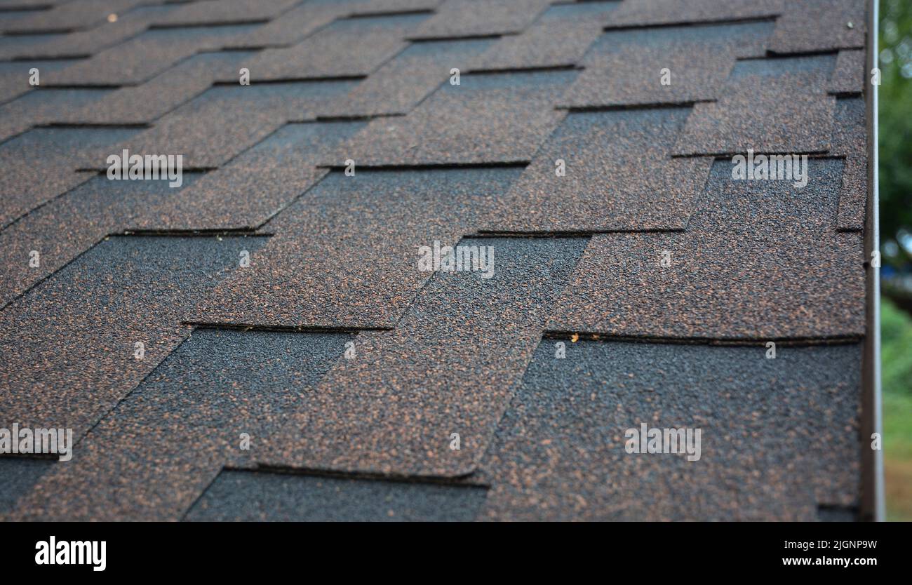 Asphalt shinges texture. House rooftop with asphalt shingles Stock ...