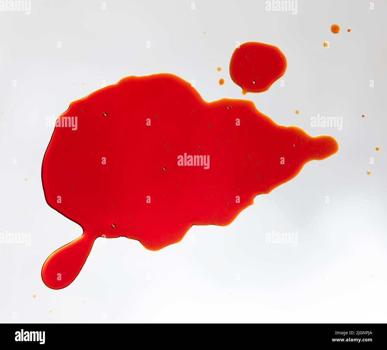 Composition of close up of red blood stains on white background Stock ...