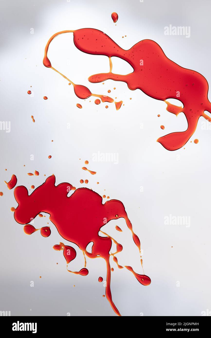 Composition of multiple red blood stains on white background Stock ...