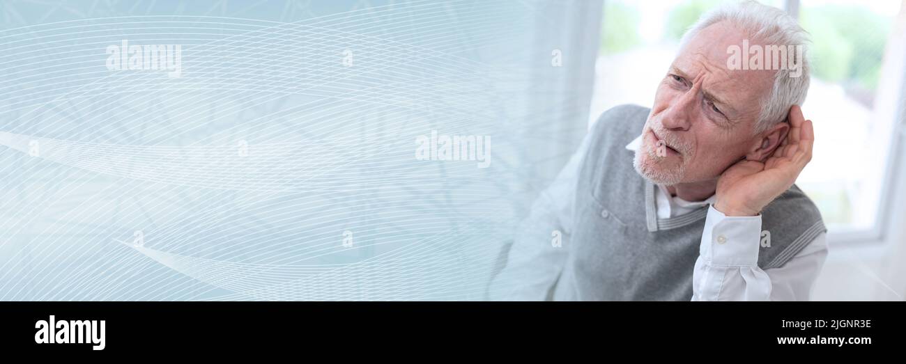 Portrait of senior man having hearing problems; panoramic banner Stock ...