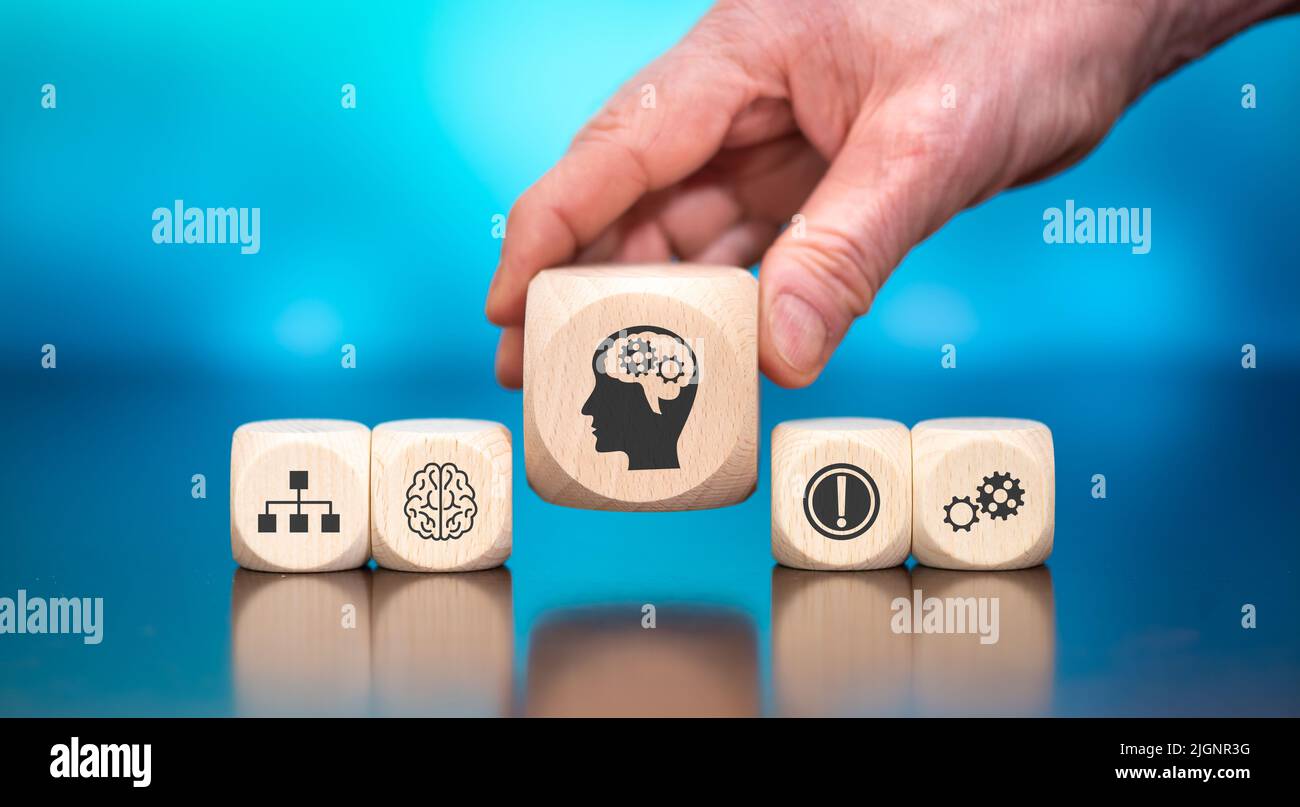 Wooden blocks with symbol of knowledge concept on blue background Stock ...