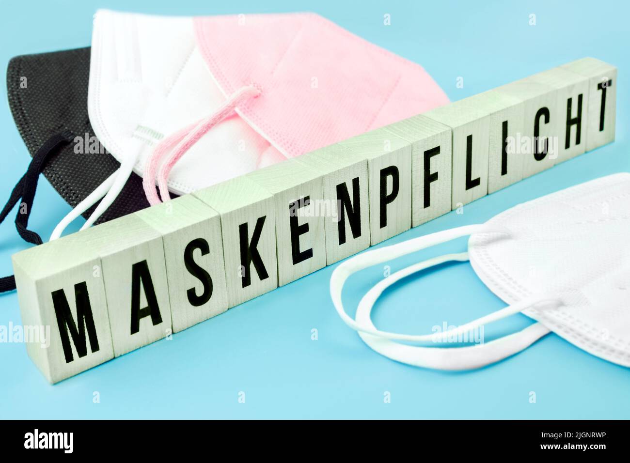 German Mandatory FFP2 Face Masks on blue background blue sign Stock ...