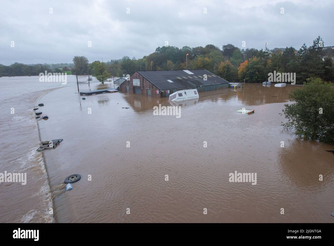 River Towy overcomes flood defences and inunbdates Ken Williams garage ...