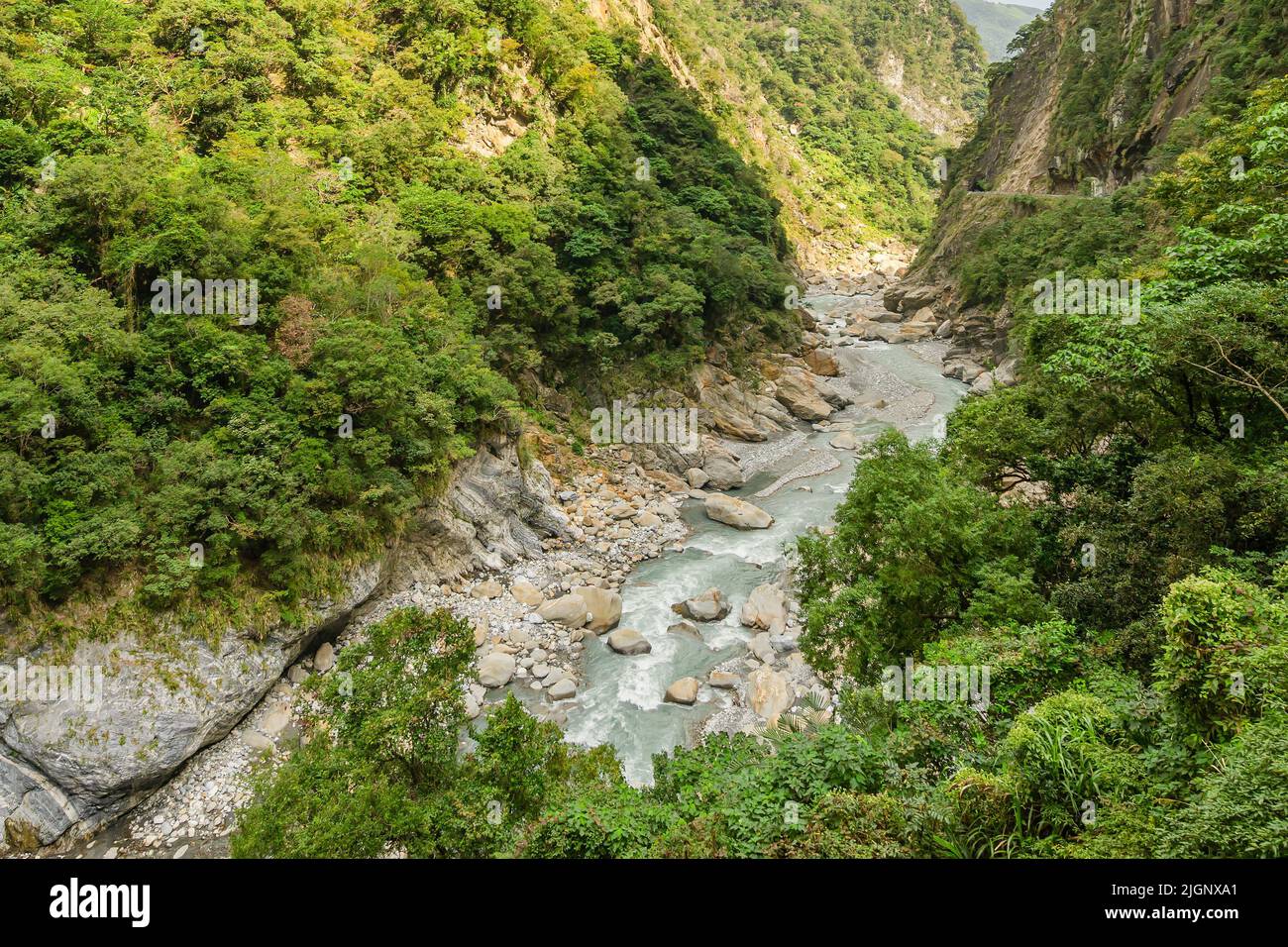 Beautiful natural scenic of river inside the valley with green forest ...