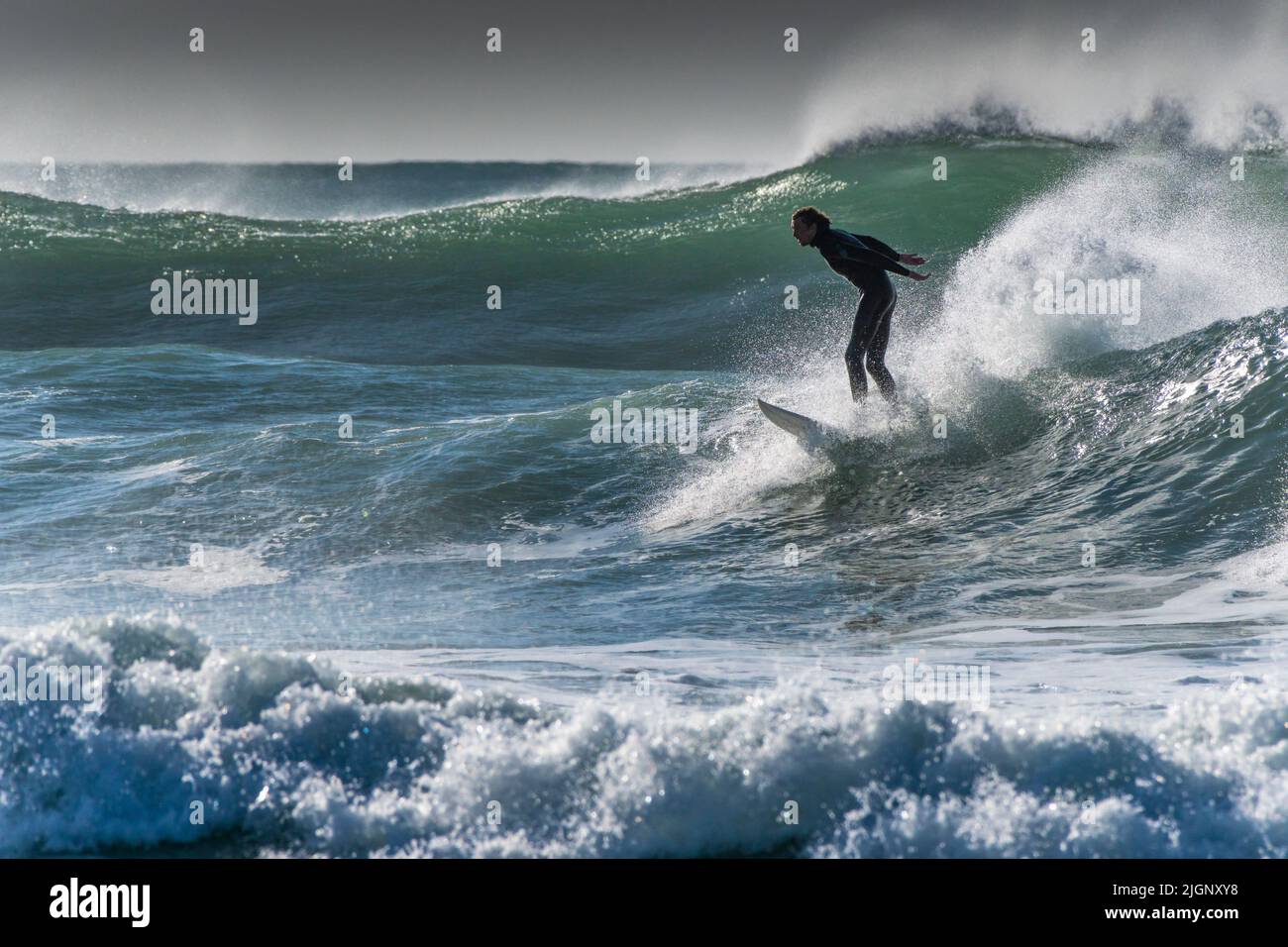 Surfing action and big waves at Fistral in Newquay in Cornwall in the ...