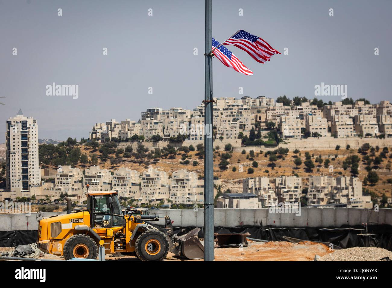 Jerusalem, Israel. 12th July, 2022. Two US flags flutter in the wind ...