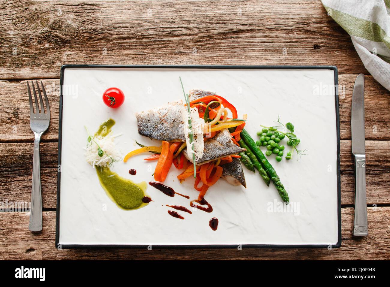 Grilled fish with fresh vegetables flat lay Stock Photo - Alamy