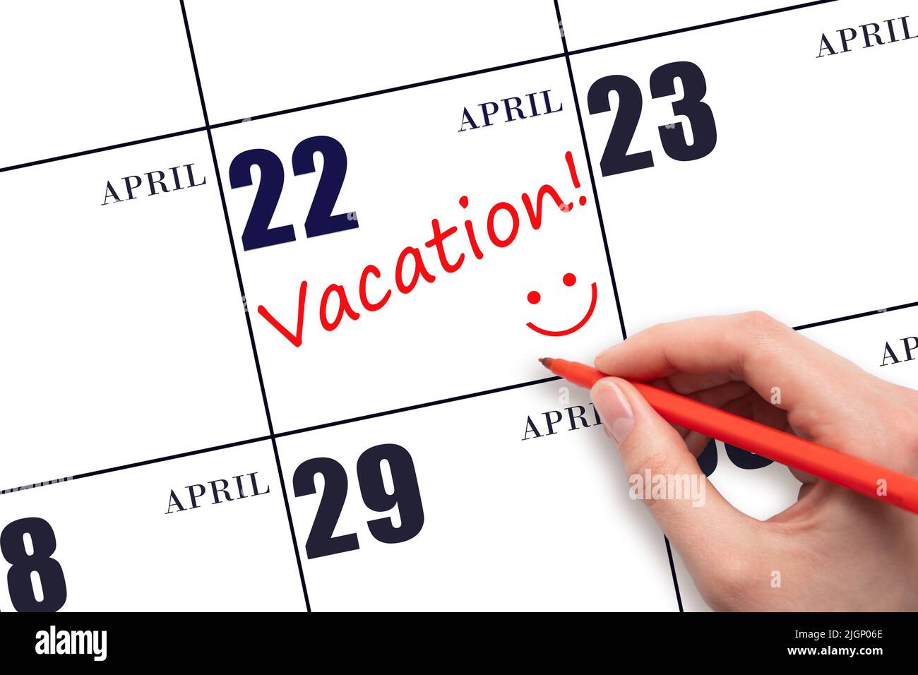 22nd day of April. A hand writing a VACATION text and drawing a smiling ...