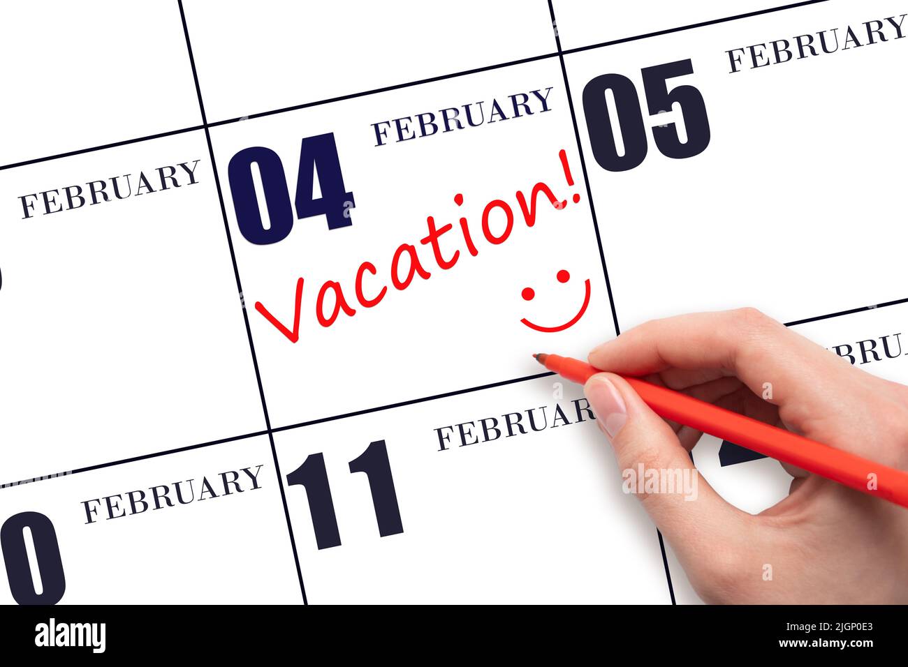 4th day of February. A hand writing a VACATION text and drawing a ...