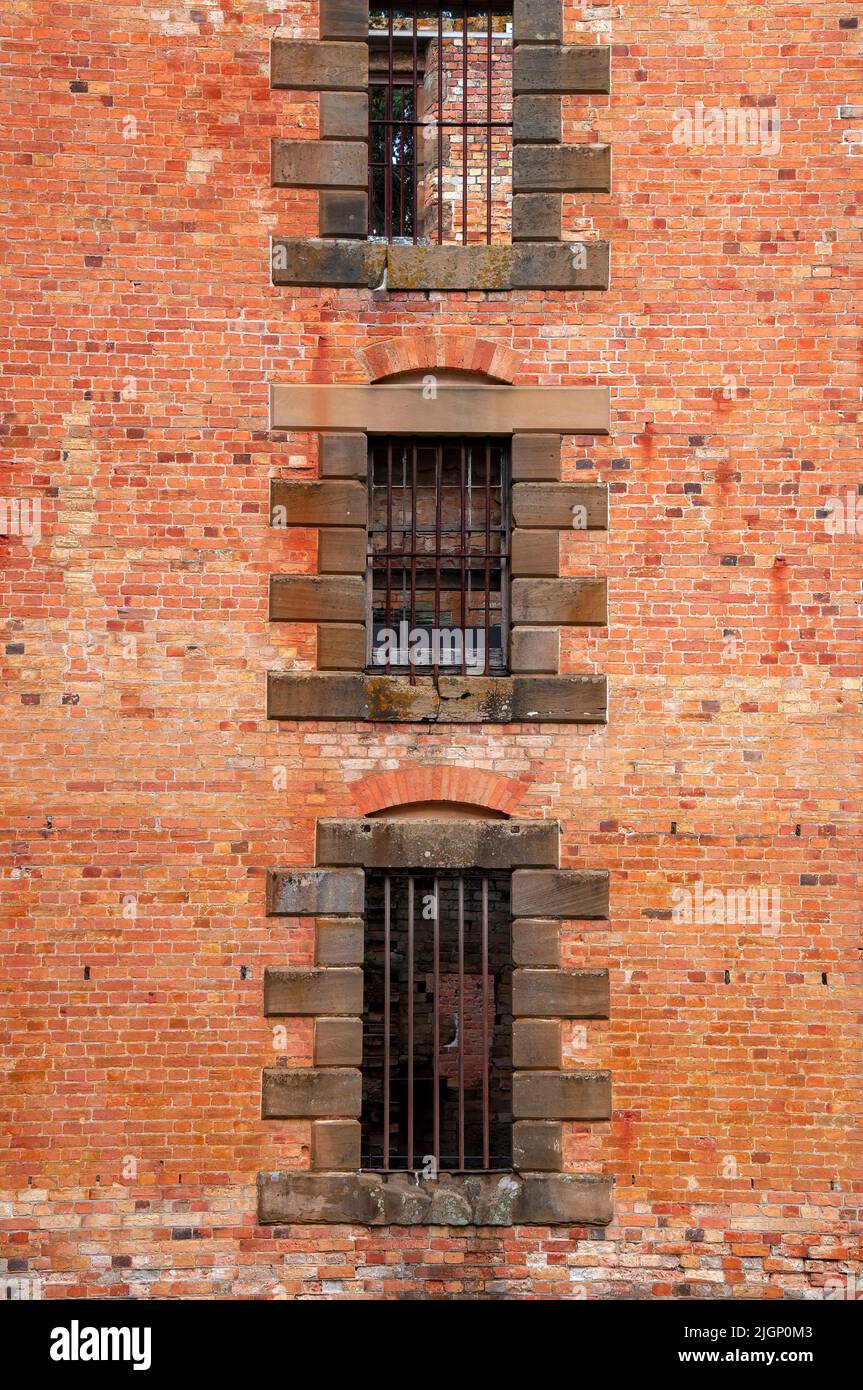 Port Arthur Australia, heritage building of red brick with metal bar ...