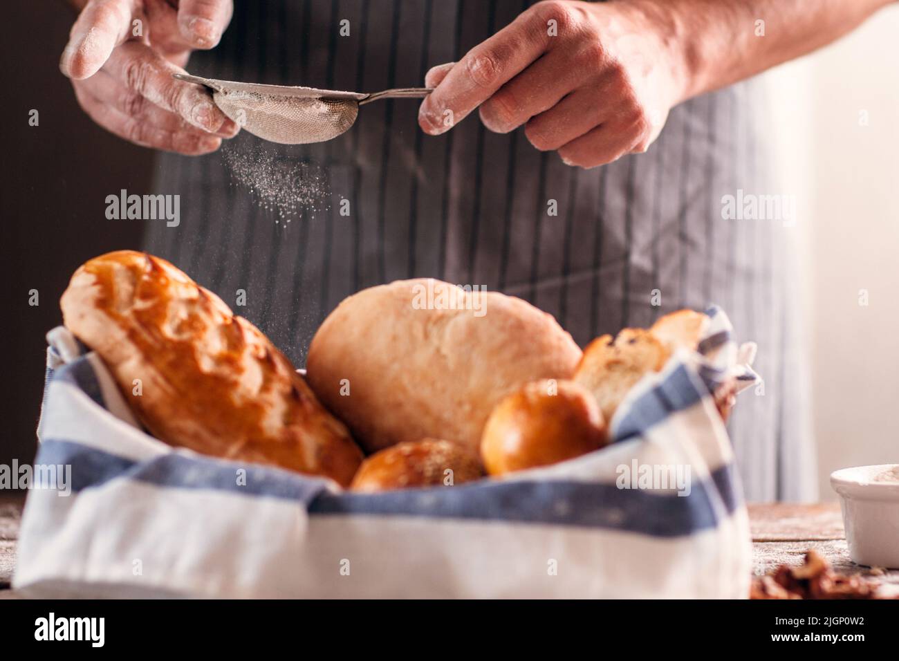 Unrecognizable baker finishing his pastry close-up Stock Photo - Alamy