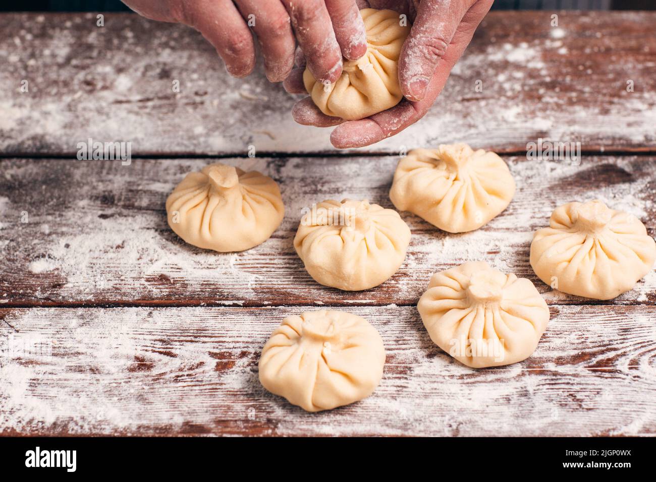 Handmade cooking of khinkali at kitchen Stock Photo - Alamy