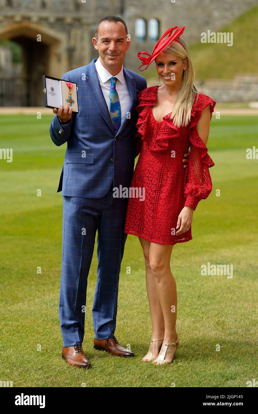 Martin Lewis with his wife Lara Lewington, after being made a CBE at an ...