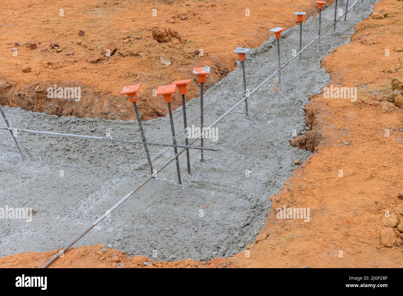 A strip foundation reinforcement frame was constructed on the house's ...