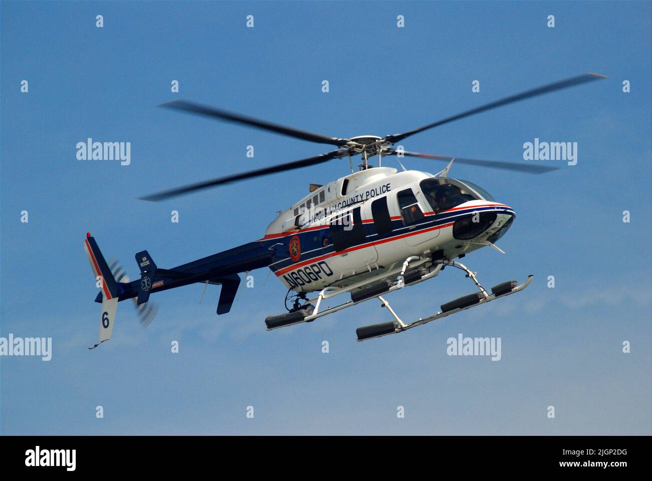 A Nassau County Police Helicopter patrols from the sky during an event ...