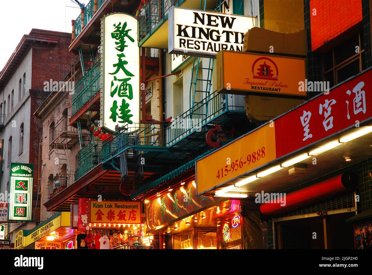 As dusk descends on Chinatown in San Francisco, the signs of the ...