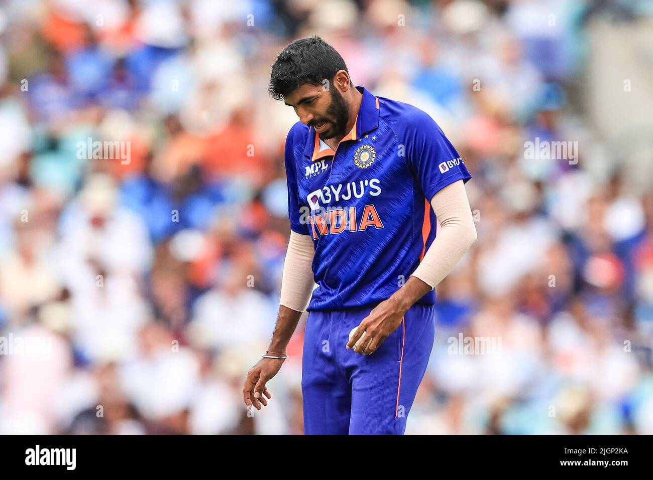 Jasprit Bumrah of India polishes the ball Stock Photo - Alamy
