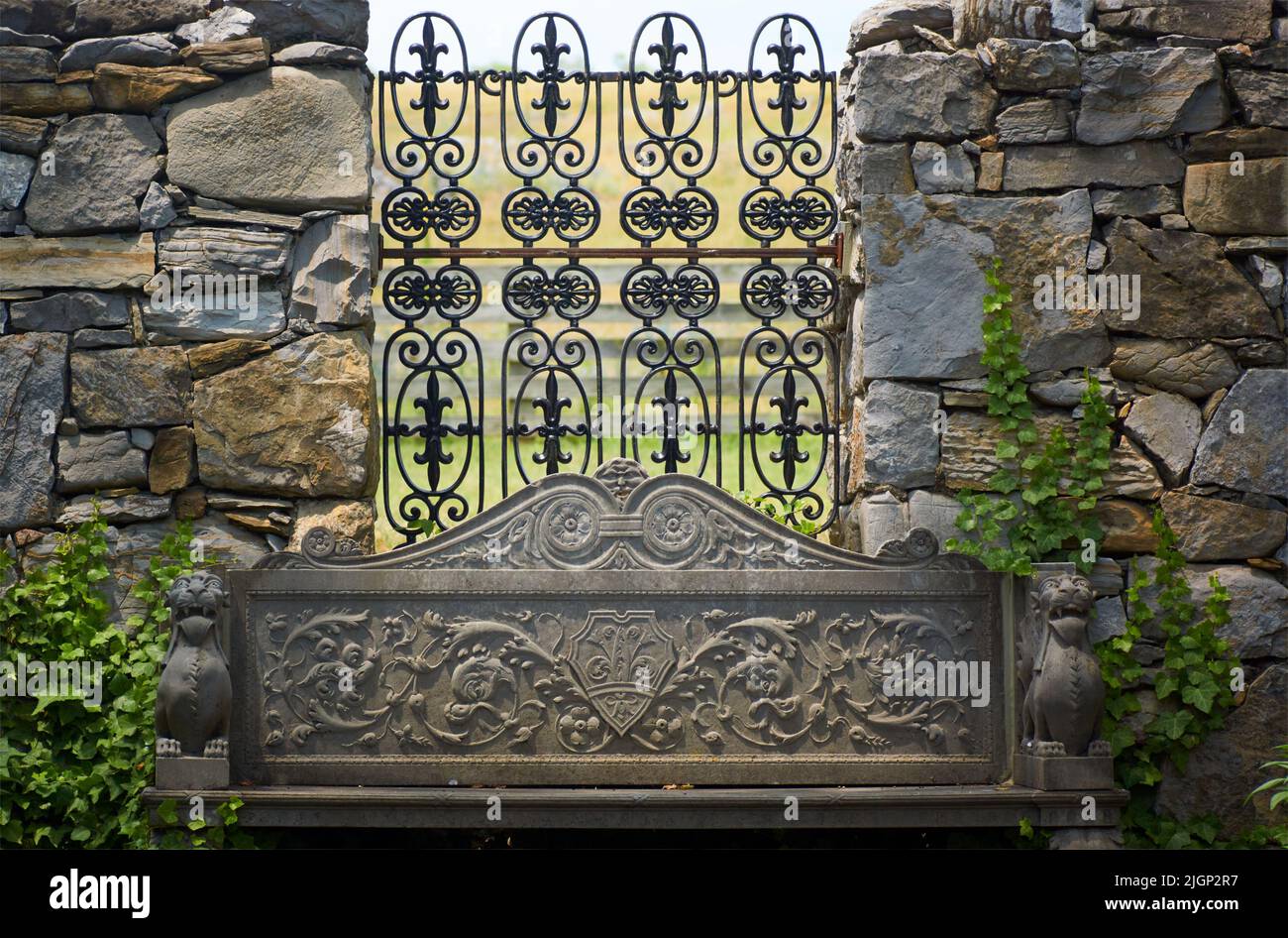 Stone bench and wrought iron fence in the garden of the Shenandoah ...