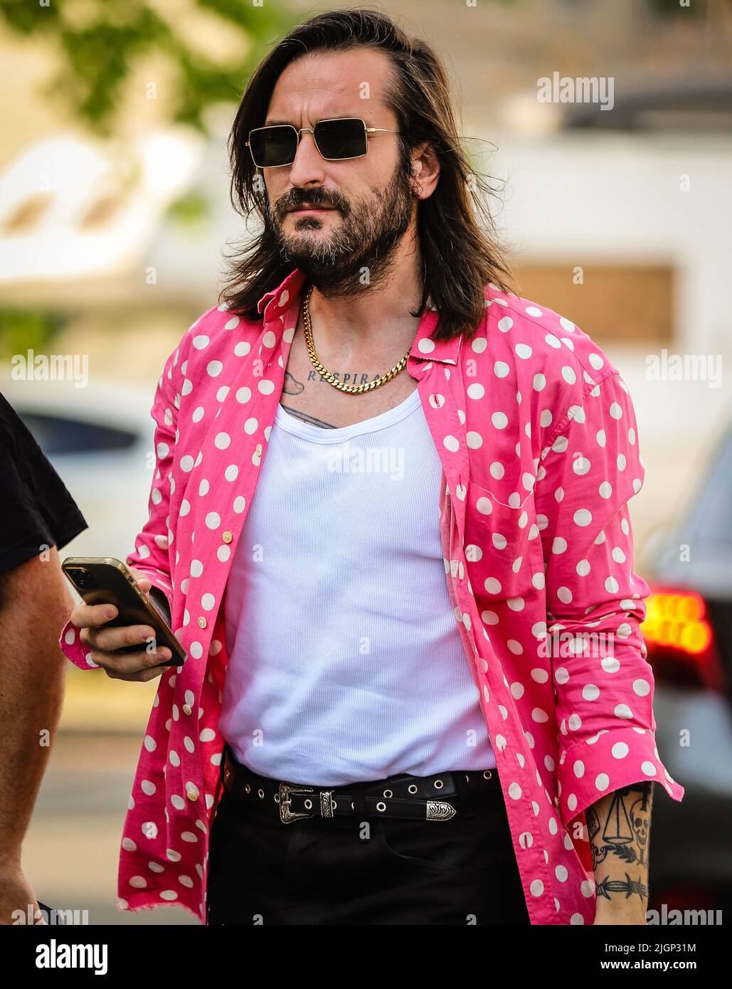 MILAN, Italy- June 17 2022: Alessio Aramini on the street in Milan ...