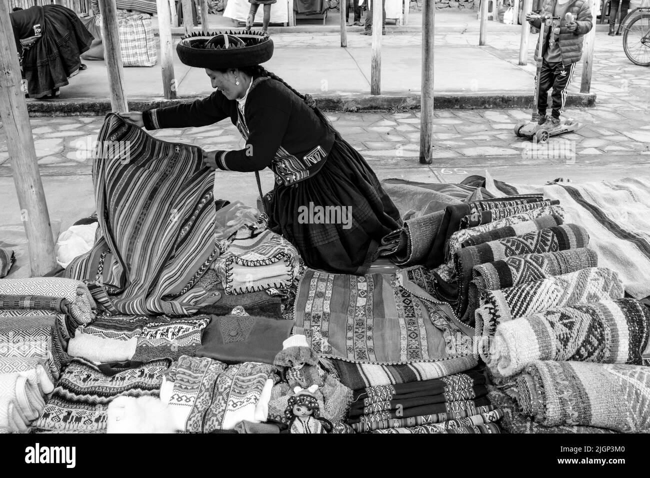 A Peruvian Indigenous Quechua Woman Selling Woollen Handicrafts At The ...