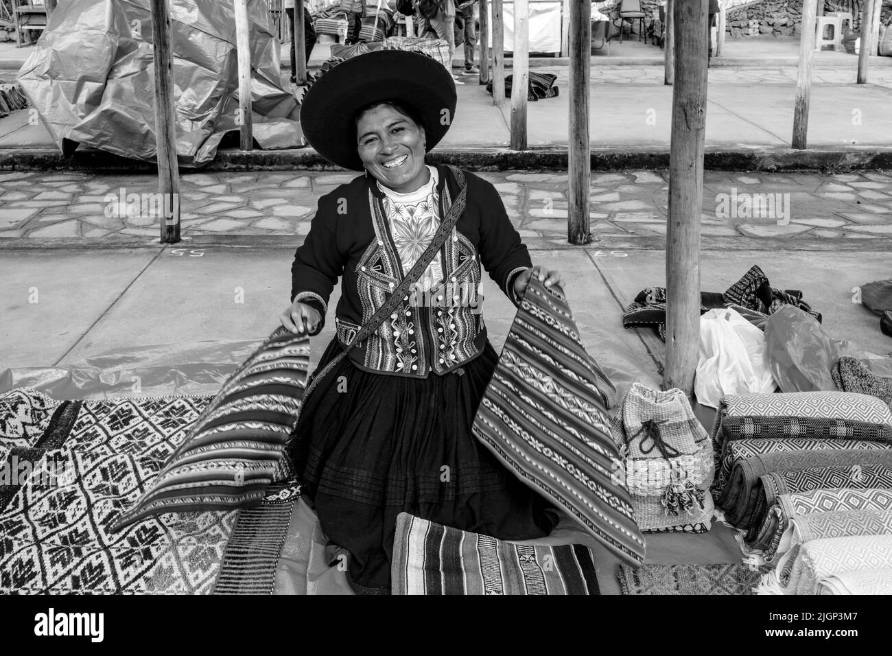 A Peruvian Indigenous Quechua Woman Selling Woollen Handicrafts At The ...