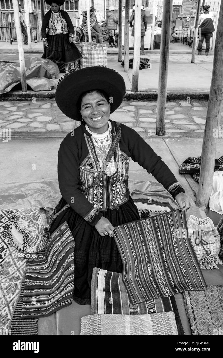 A Peruvian Indigenous Quechua Woman Selling Woollen Handicrafts At The ...