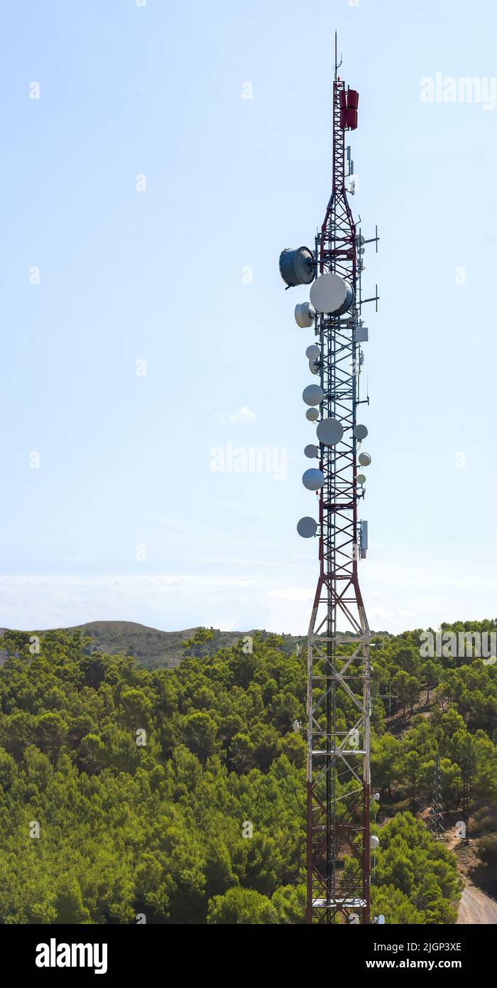 Panoramic vertical format of a communications antenna in the middle of ...