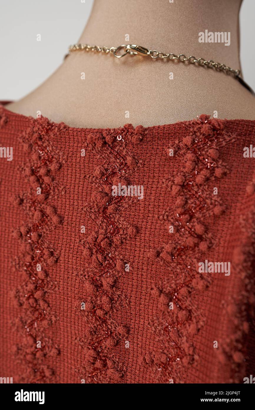 Orange blouse back detail. Women's formal wear Stock Photo - Alamy