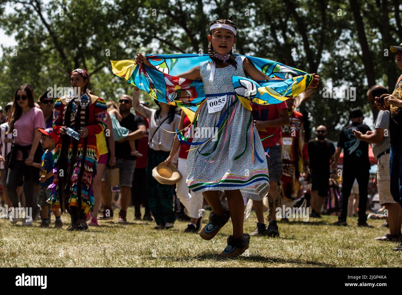 Pow-wow traditional dancers open the arena to the spectators during the ...