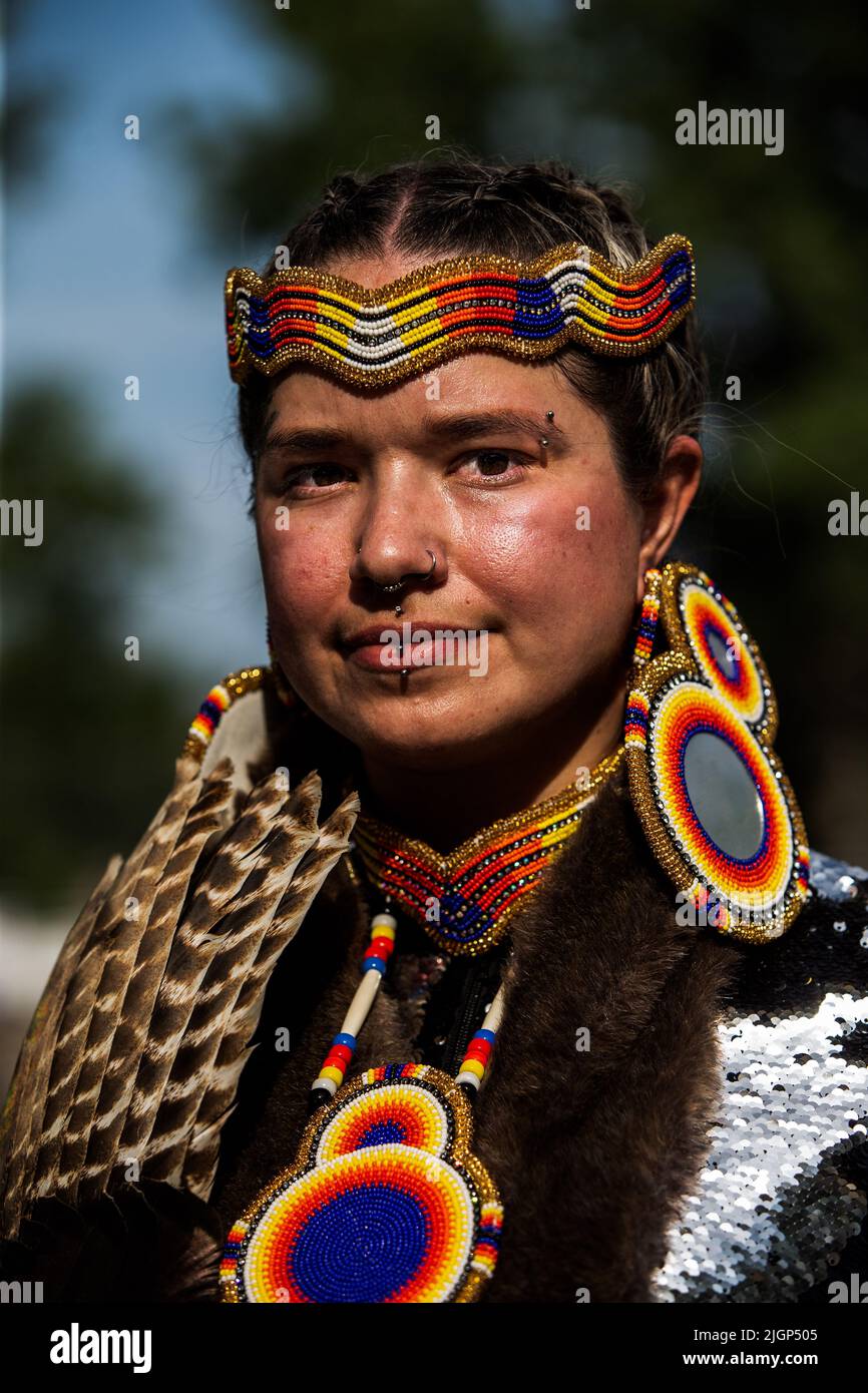 A pow-wow dancer in traditional costume during the festival Stock Photo ...