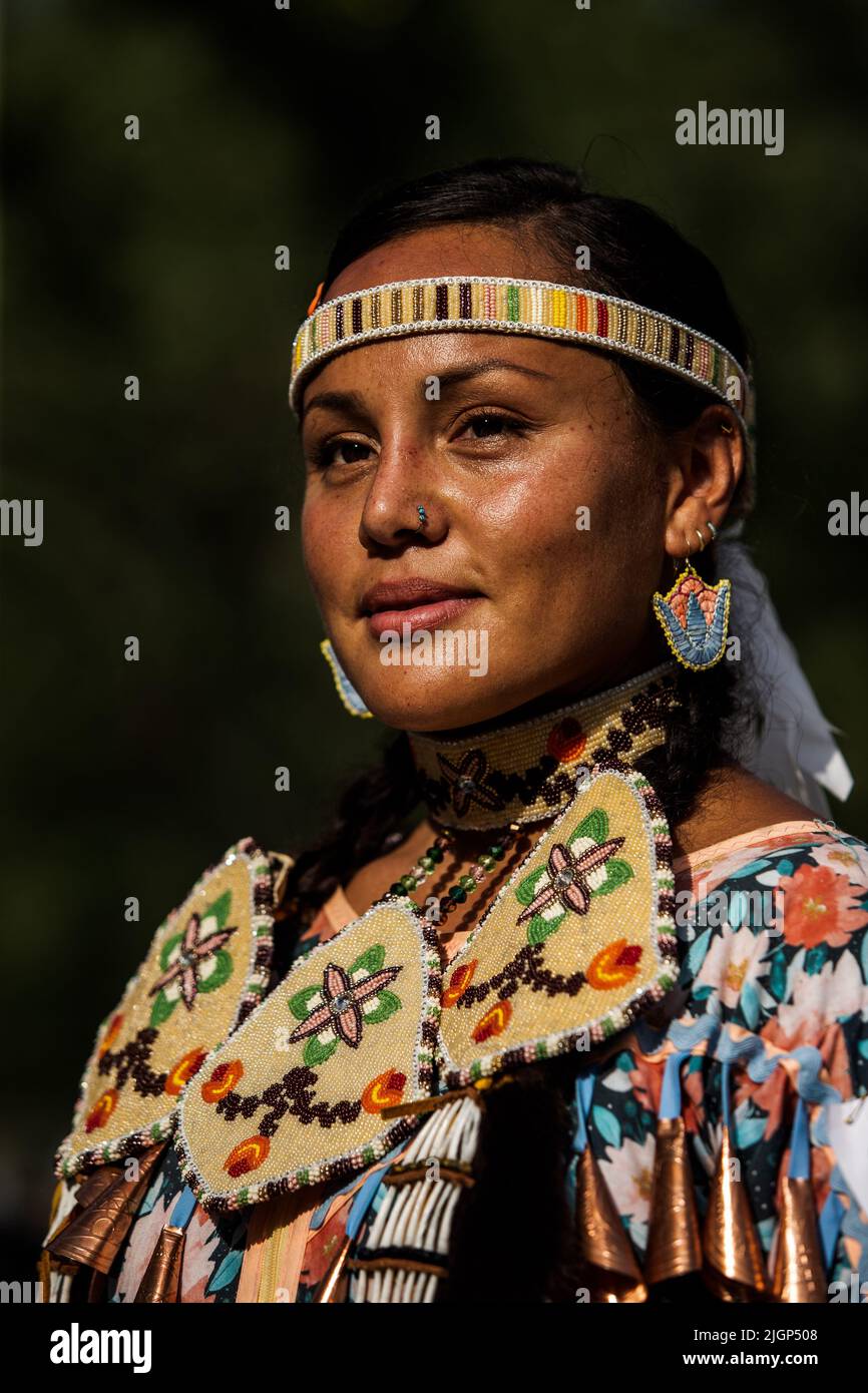 A pow-wow dancer in traditional costume during the festival Stock Photo ...