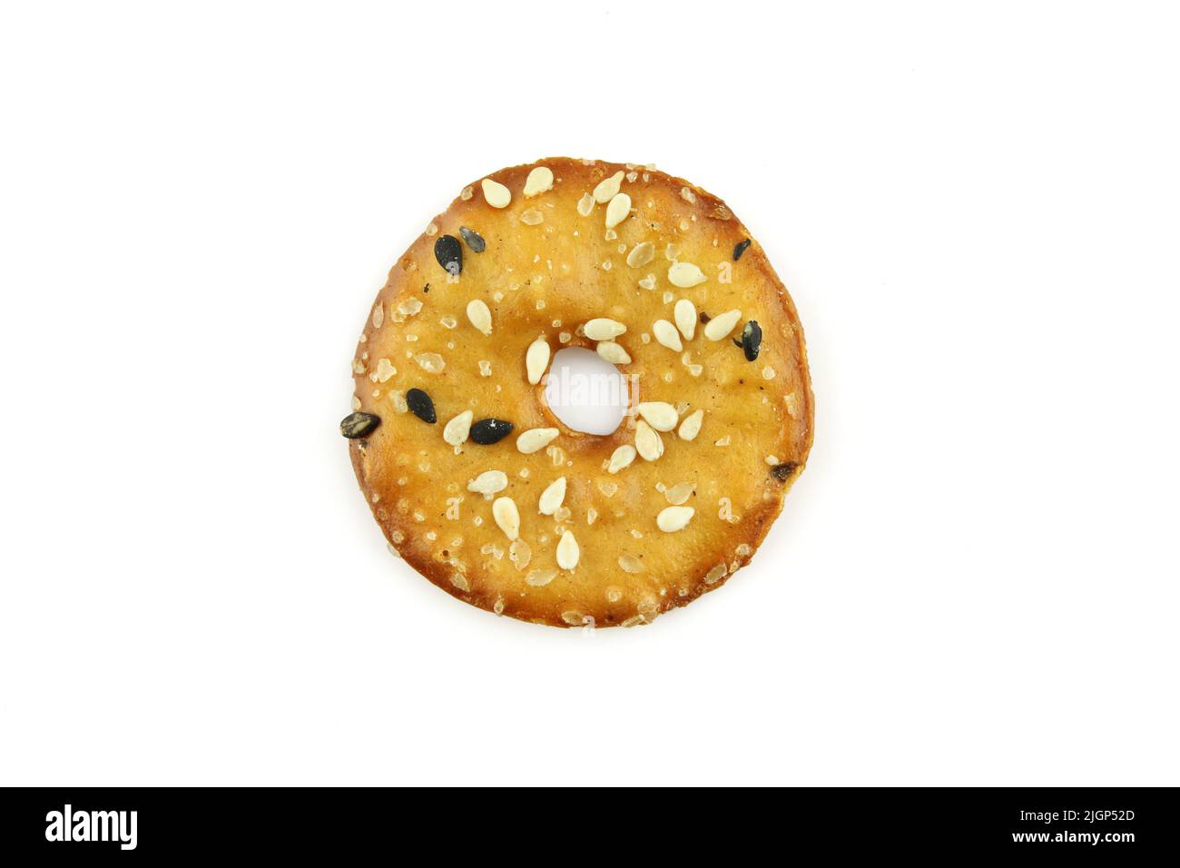 Single round cracker with sesame seeds isolated on white background ...