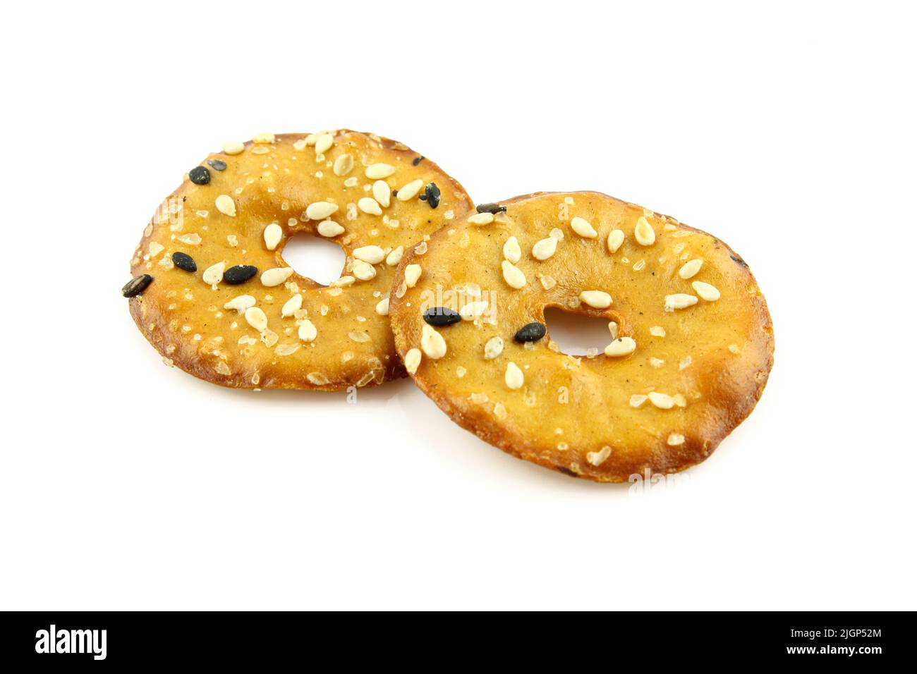 Two round cracker with sesame seeds isolated on white background Stock ...