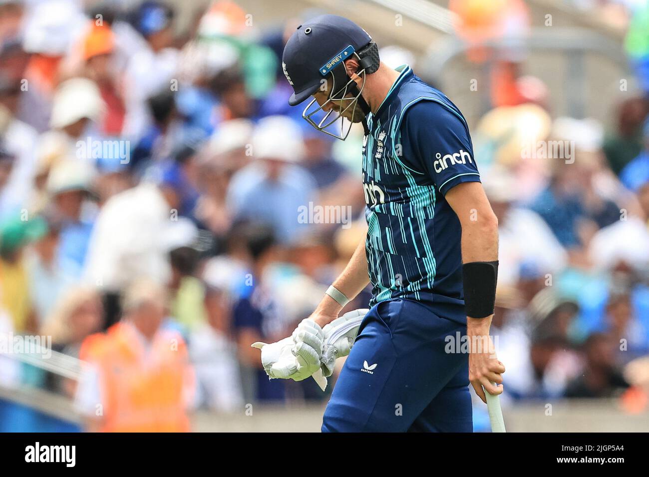 Craig Overton of England leaves the field after Mohamed Shami of India ...