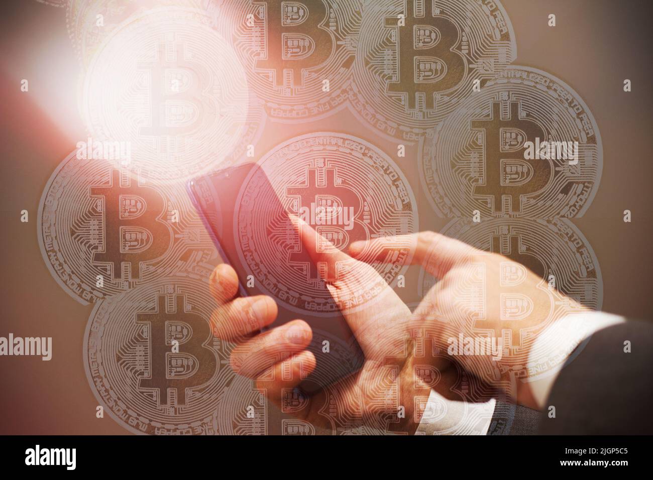 Business man hands while pushing with the finger the cellphone concept ...