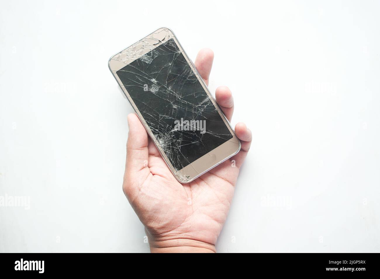 Man hand holding broken smart hi-res stock photography and images - Alamy