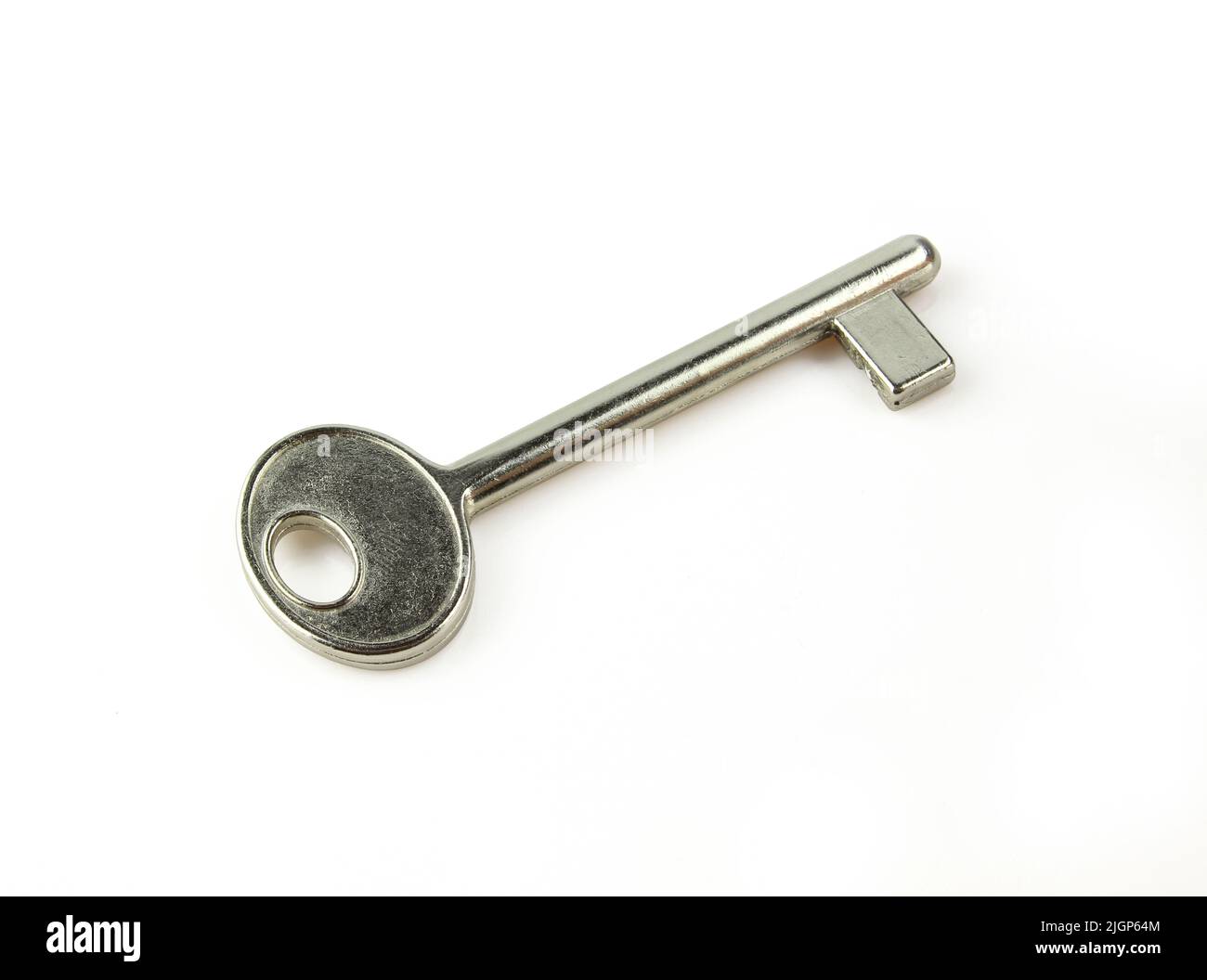 Single retro looking metallic door key isolated on white background ...