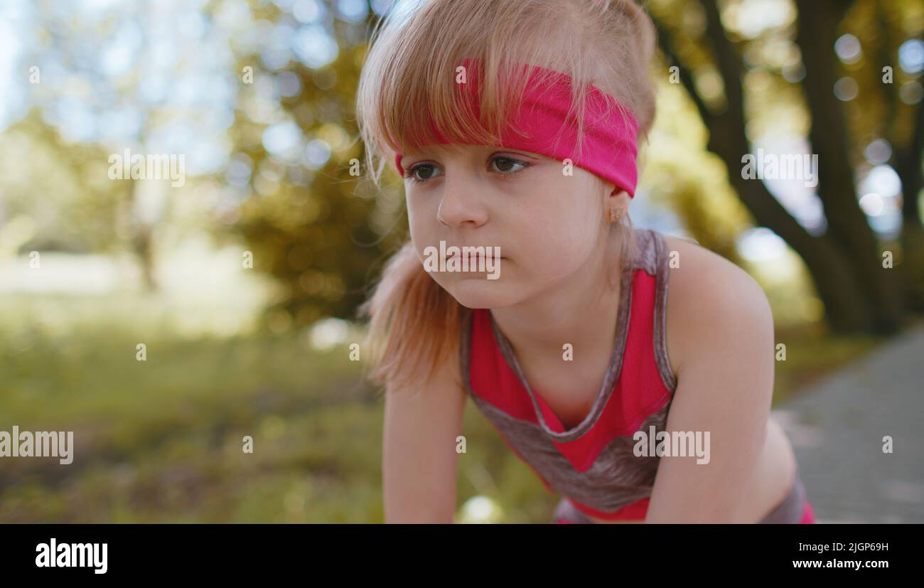 Athletic fitness sport motivated runner child girl training, preparing ...