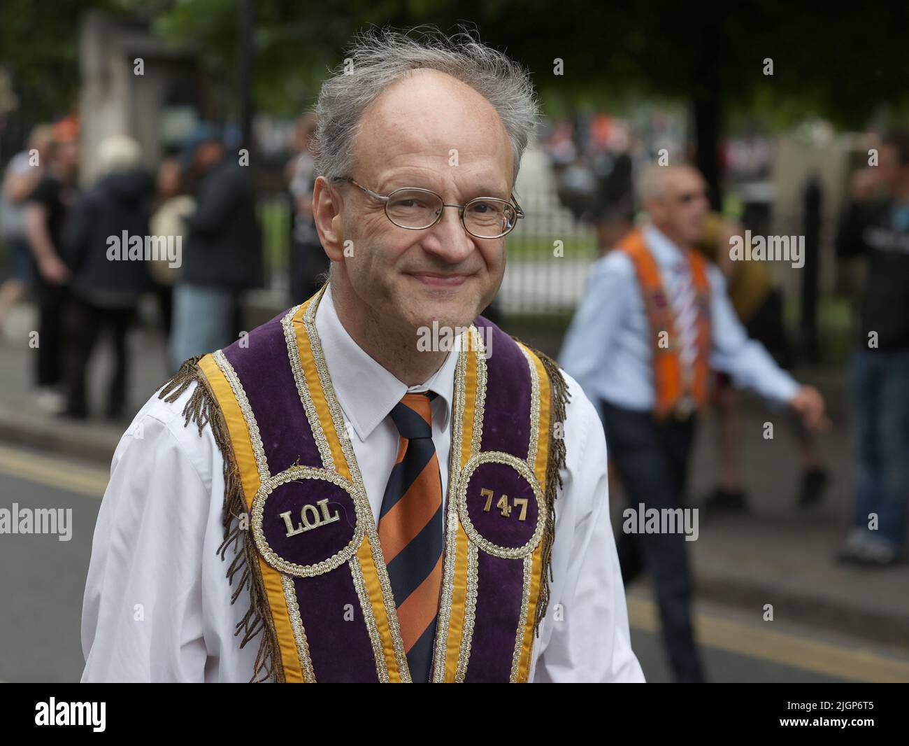 DUP's Peter Weir takes part in a Twelfth of July parade in Belfast, as ...