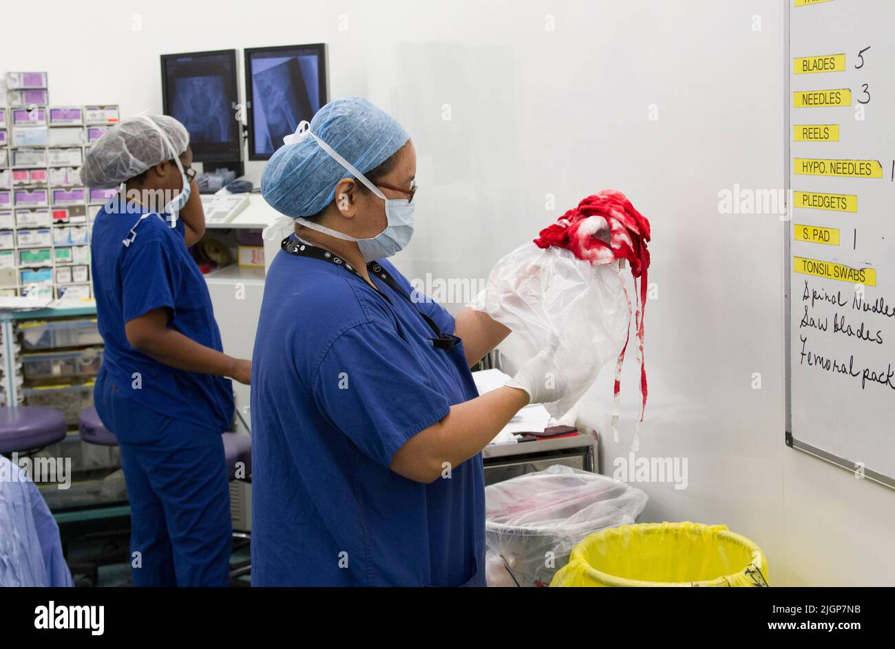 Bandages and swabs stained with blood hi-res stock photography and ...