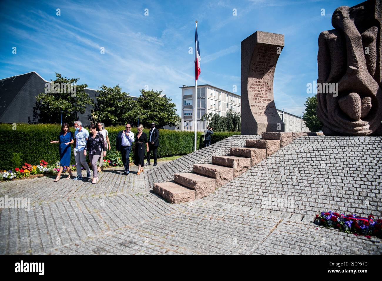 Paris' mayor Anne Hidalgo walks away from the Monument to the Deported ...