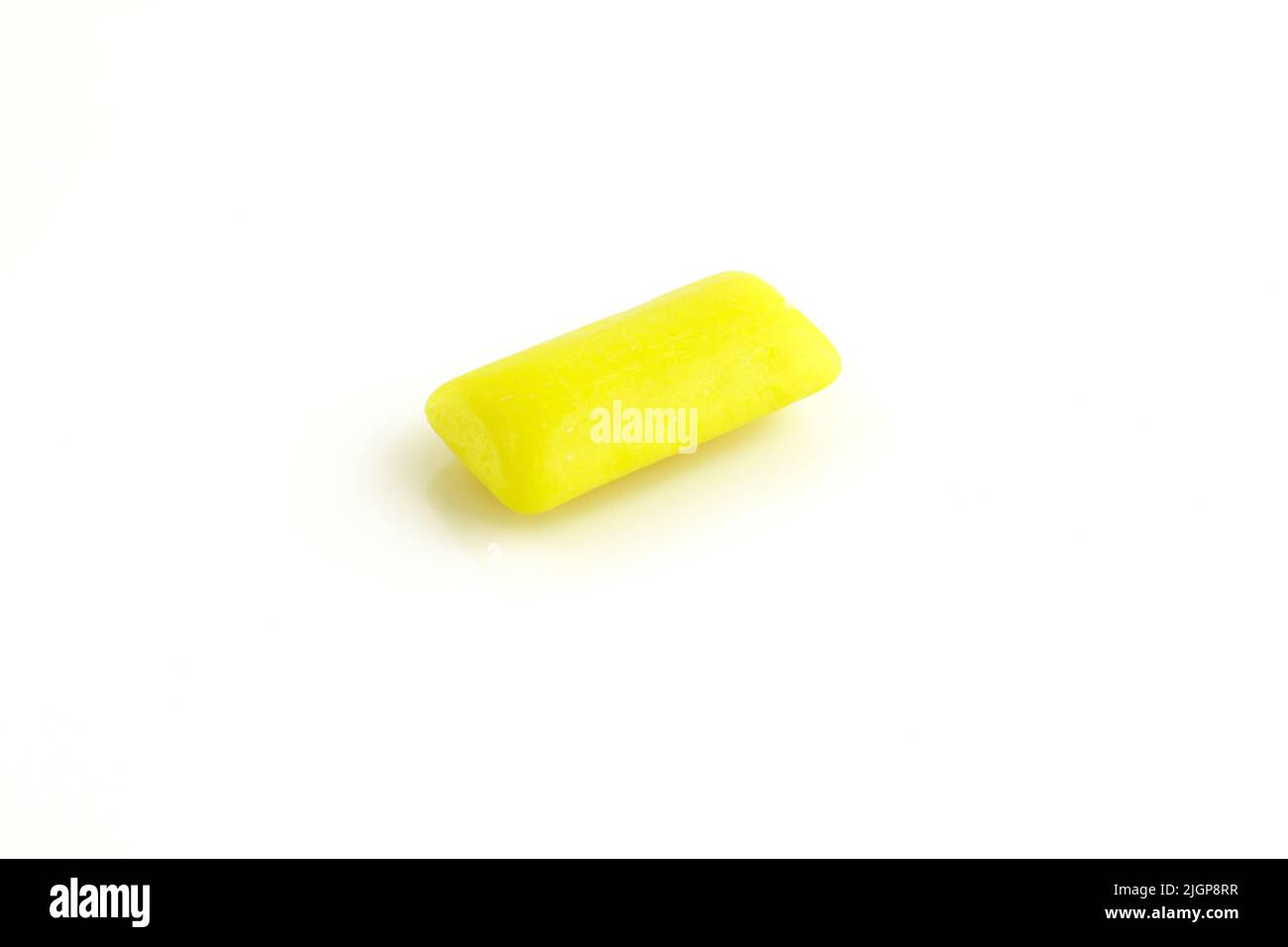 Single yellow gum mint isolated on white background Stock Photo - Alamy