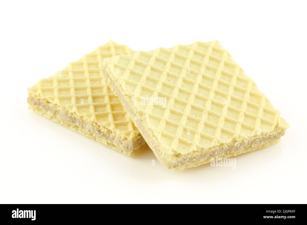 Two thin vanilla cream filled wafers isolated on white background Stock ...