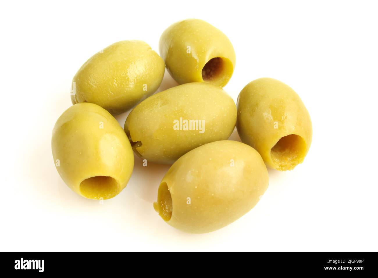 Group of wet olives without seed core isolated on white background ...