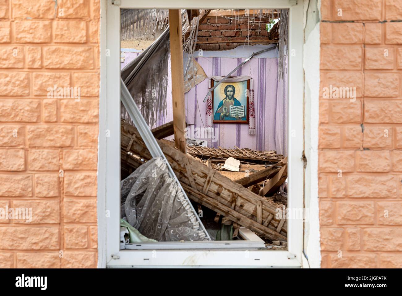 The icon of the Mother of God in a completely destroyed church due to ...