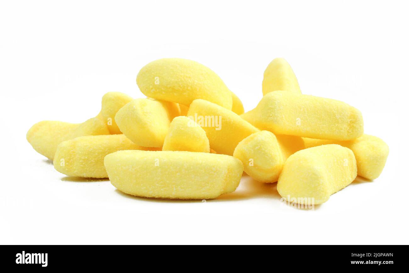 Group of foam banana sweets isolated on white background. Candies for ...