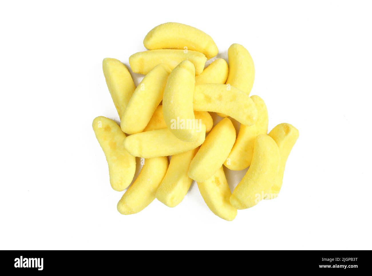 Group of foam banana sweets isolated on white background. Candies for ...
