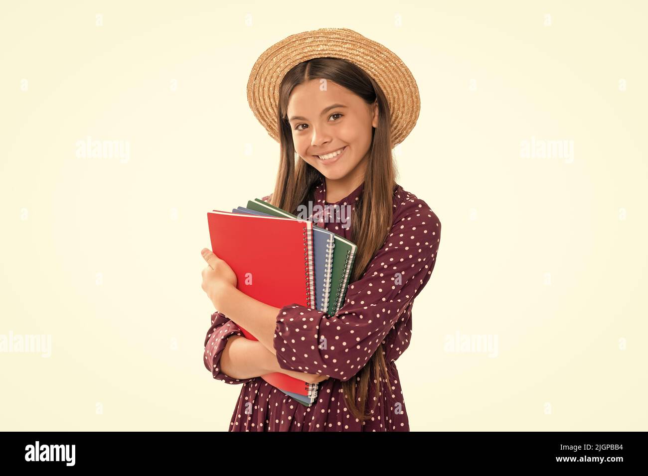 back to school. child in straw hat ready to study. childhood ...